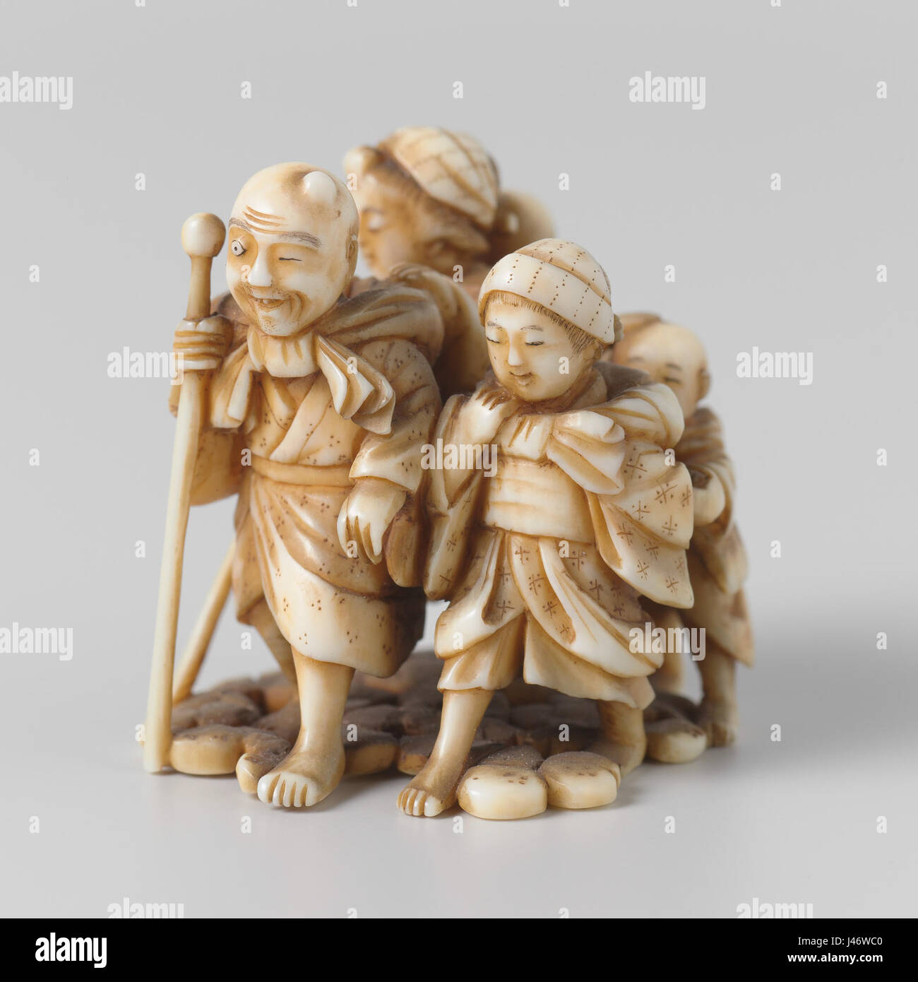 This title references a netsuke, a small Japanese carving used as a ...