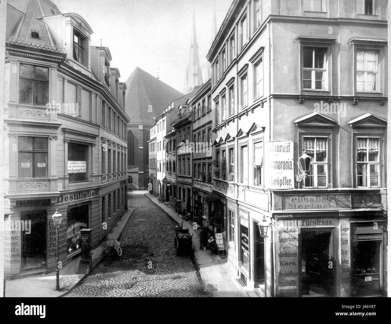 Nikolaikirchgasse in Berlin, captured around 1885, shows a street in ...