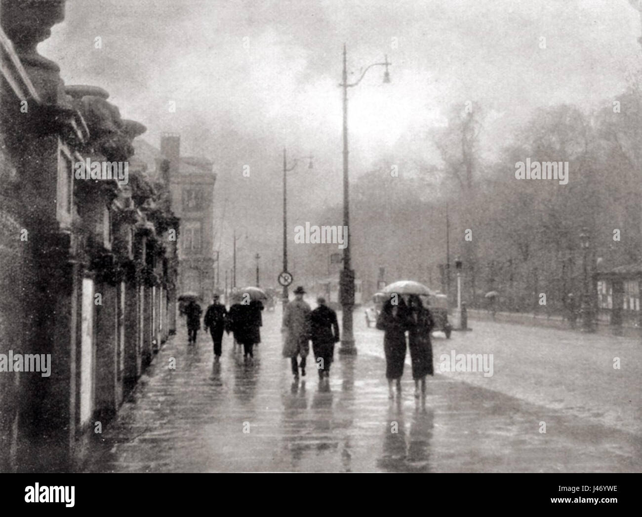 The image depicts a rainy day scene captured by the photographer ...