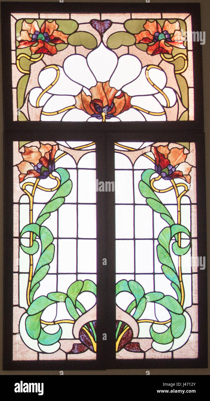 The opalescent three-light window from 1900 features glasswork that ...