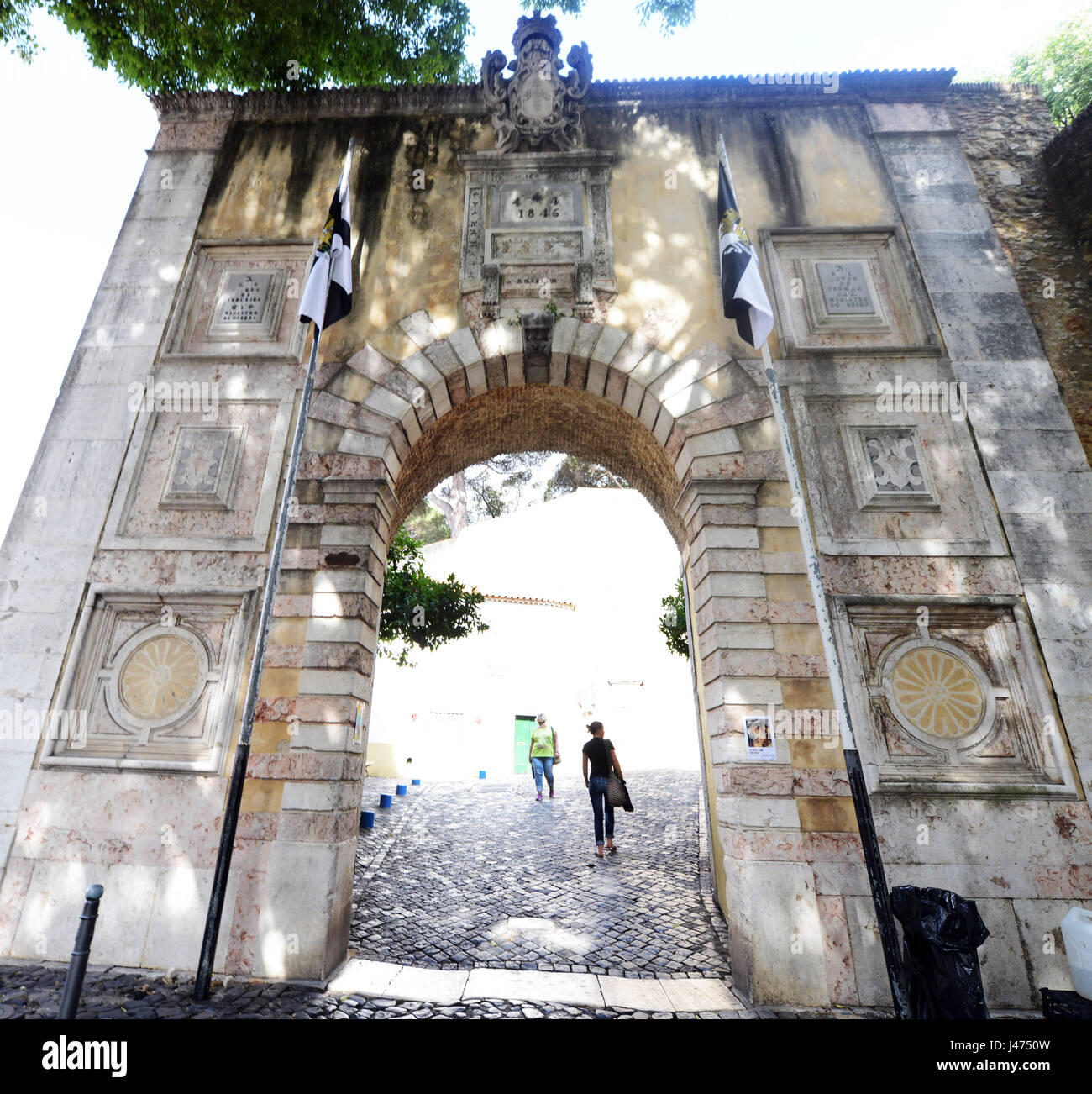 A gate leading into the Sao Jorge castle in Lisbon, Portugal Stock ...