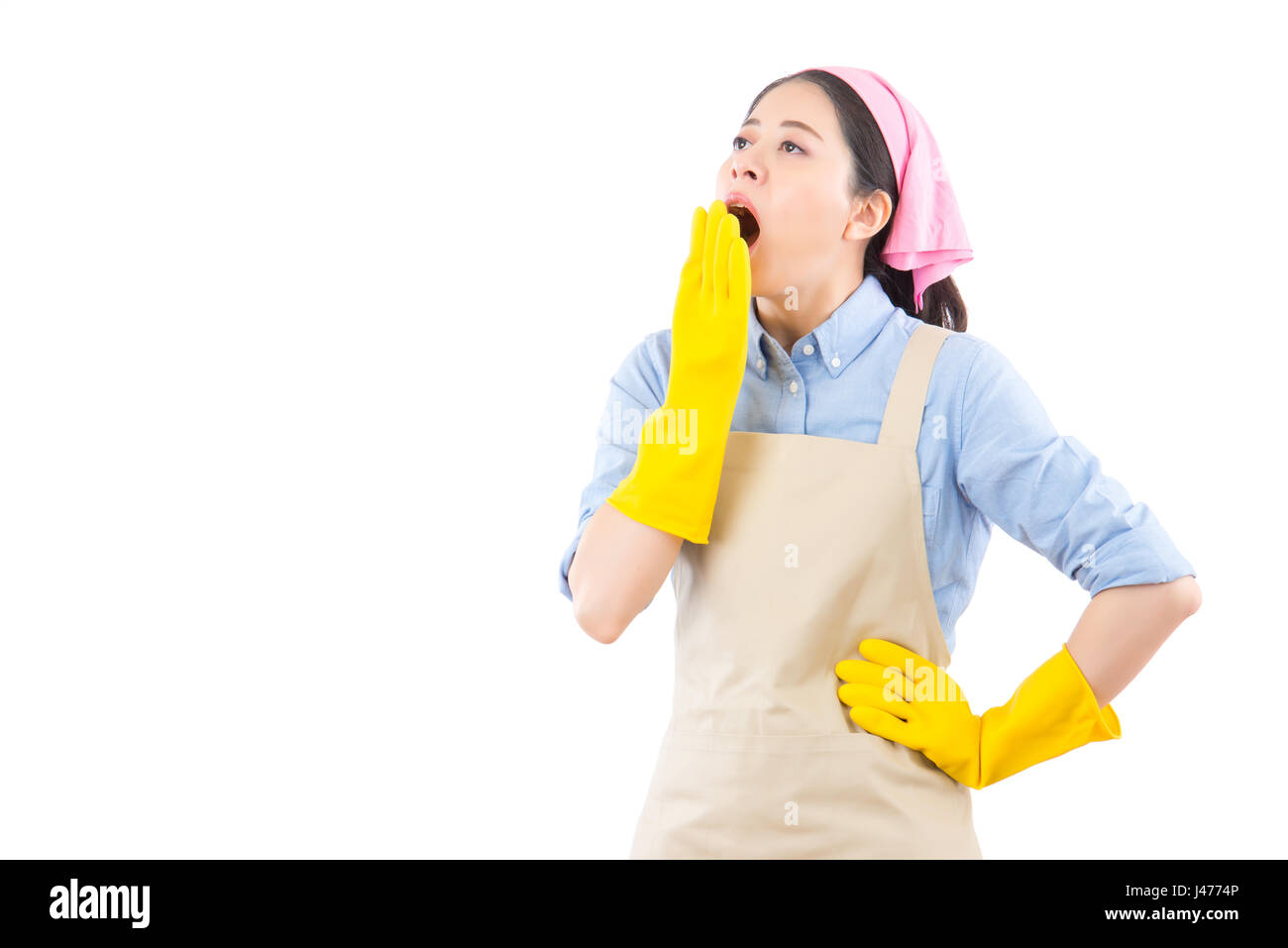 sleepy young cleaning house woman with wide open mouth yawning eyes ...