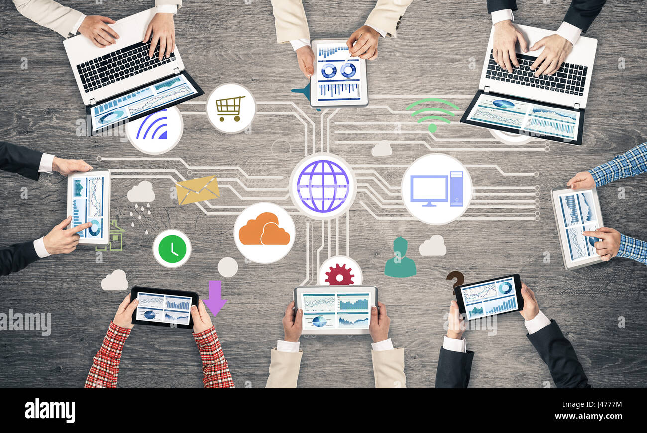 Many people using smart devices hi-res stock photography and images - Alamy
