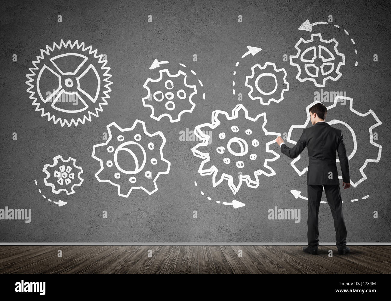 Businessman standing with back and drawing concept of teamwork and ...