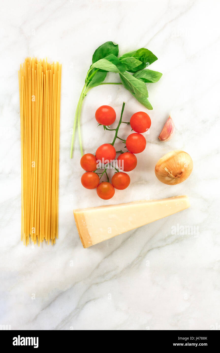 Basic pasta ingredients, including spaghetti and cheese Stock Photo - Alamy