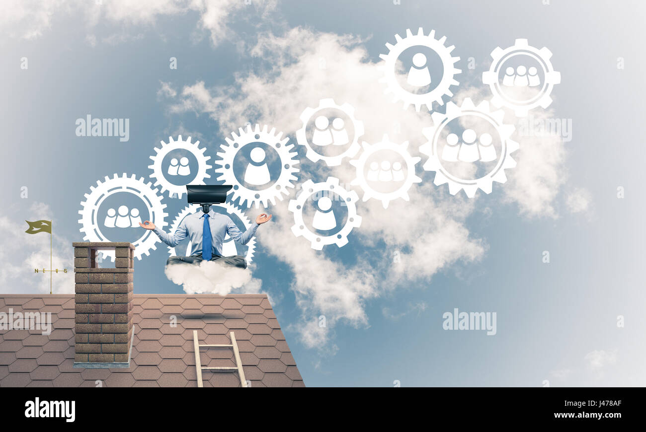 Faceless businessman with camera zoom instead of head sitting in lotus ...