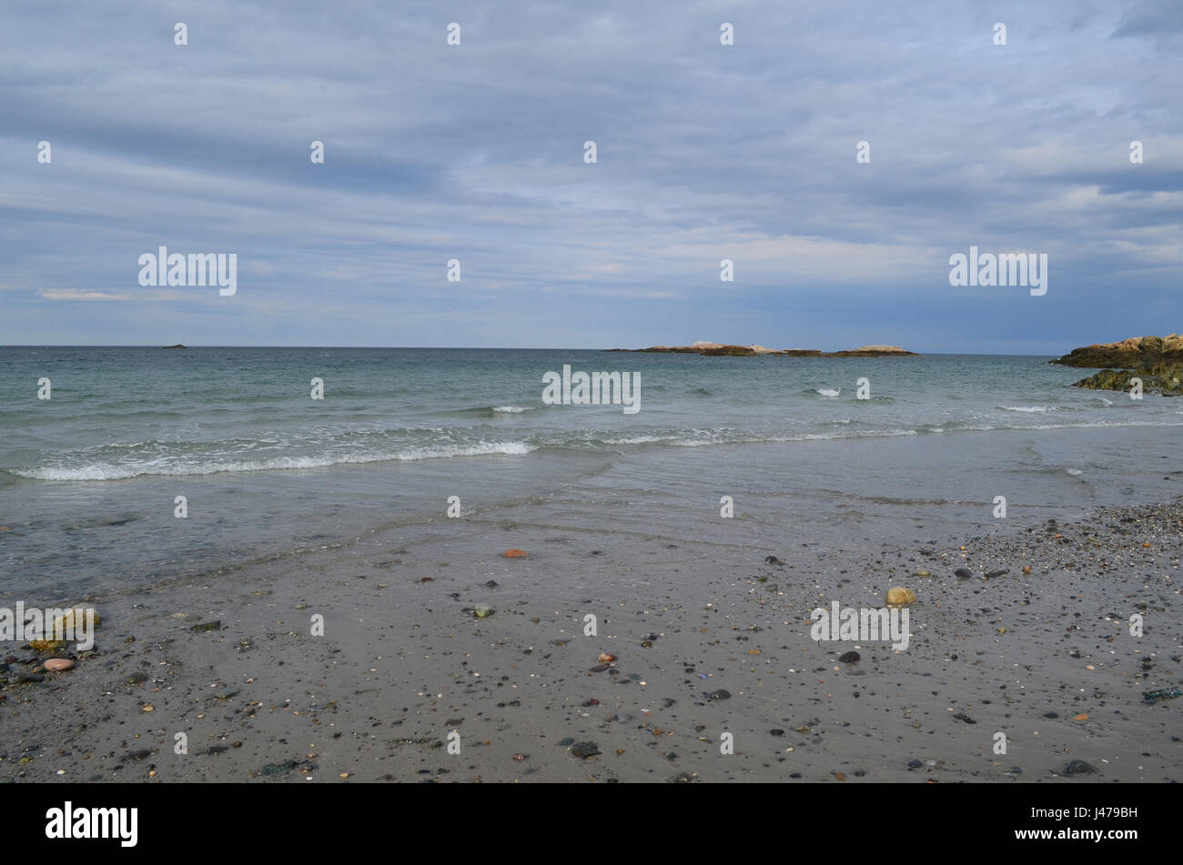Ocean waves lapping the shore in Cohasset Massachusetts Stock Photo - Alamy