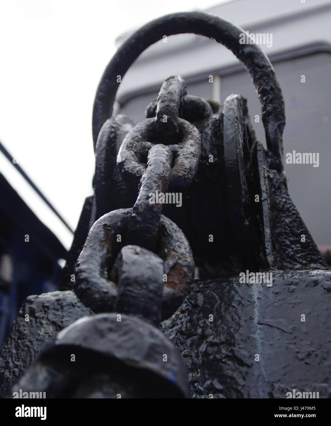 Painted chain on ship Stock Photo - Alamy