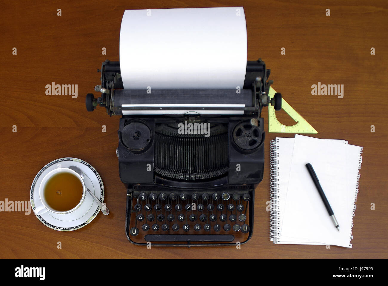 The retro typewriter on table Stock Photo - Alamy