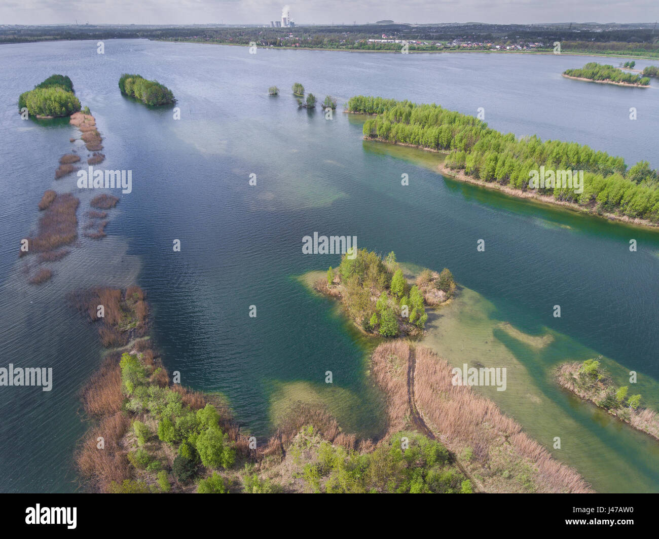 Lake and forest during spring time. View from above. Pogoria IV in ...
