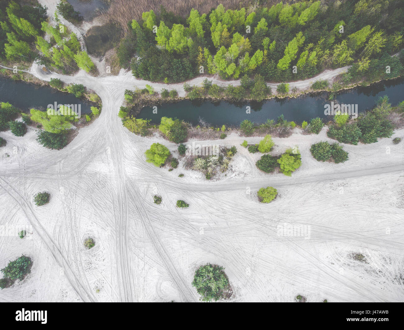 Lake and forest during spring time. View from above. Pogoria IV in ...