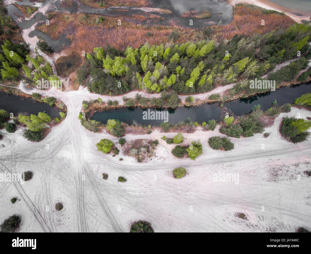 Lake and forest during spring time. View from above. Pogoria IV in ...