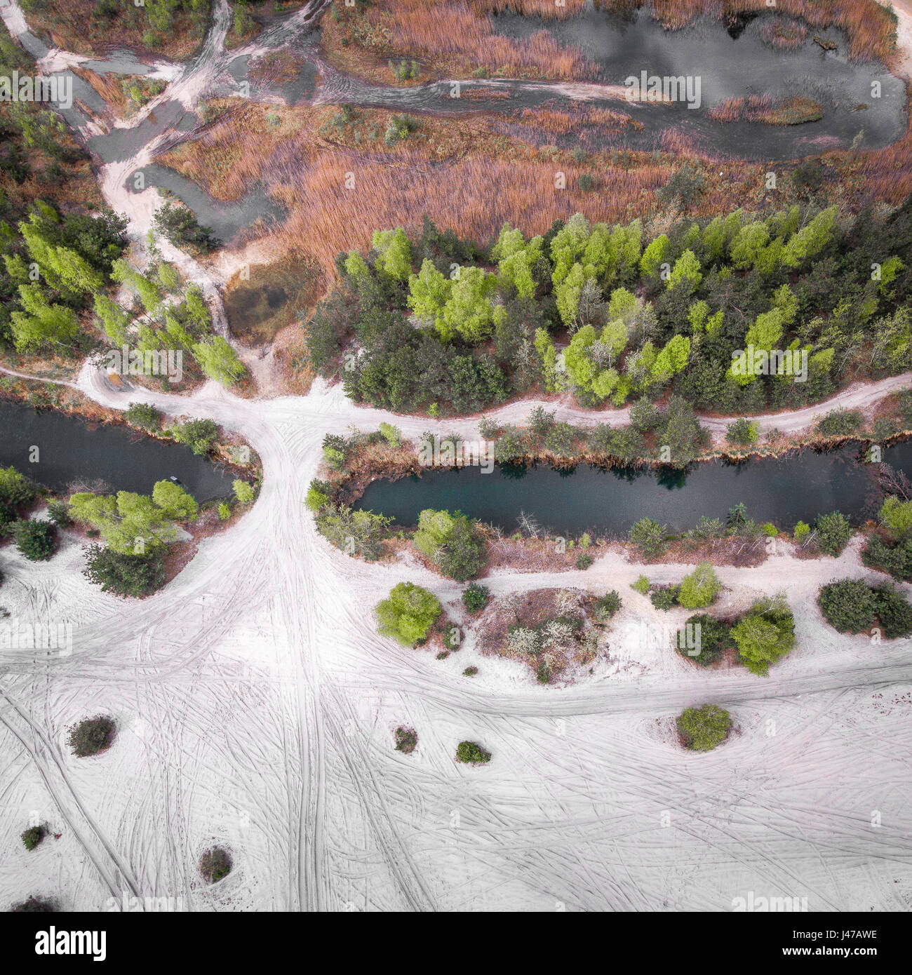 Lake and forest during spring time. View from above. Pogoria IV in ...