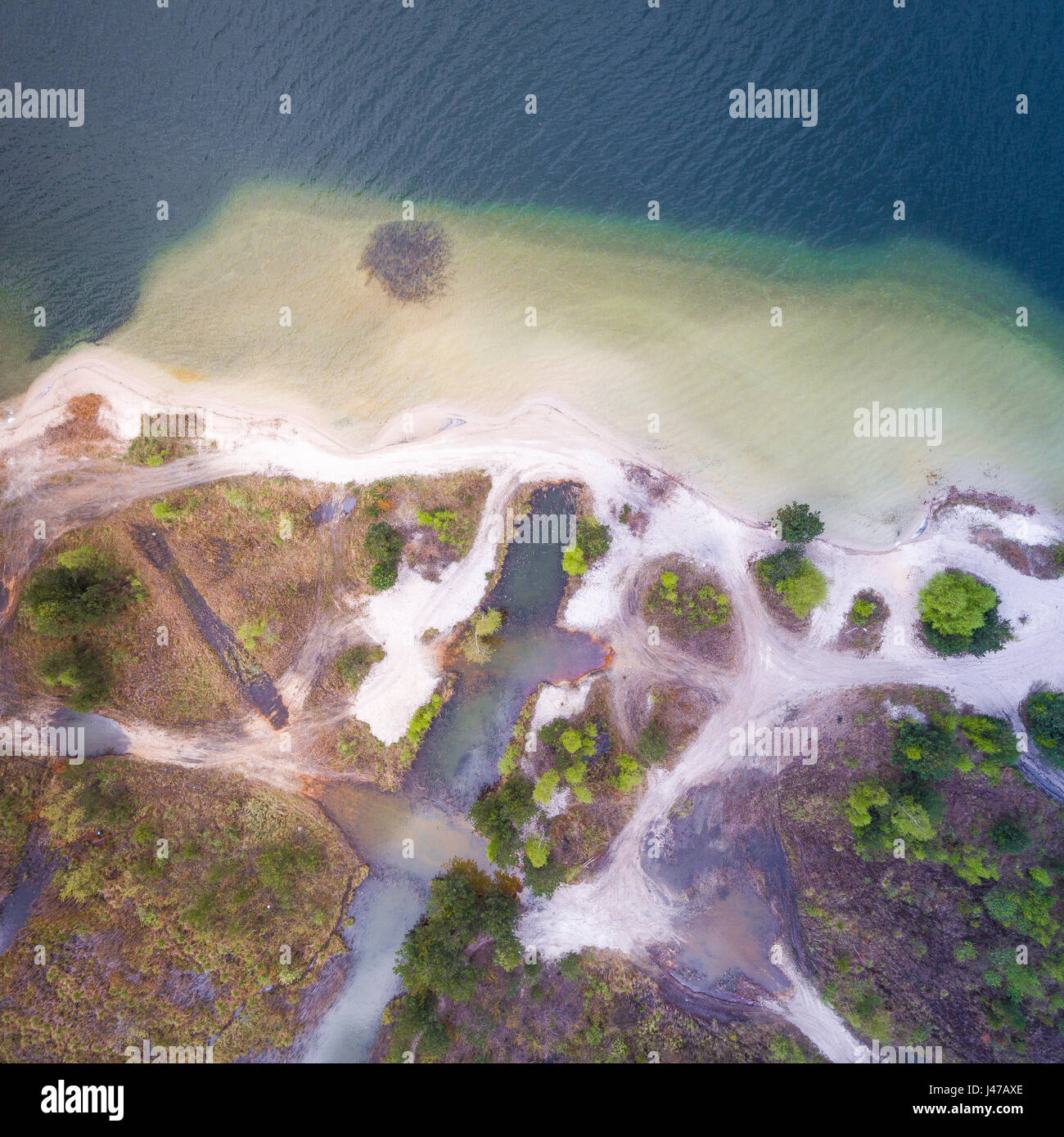 Lake and forest during spring time. View from above. Pogoria IV in ...