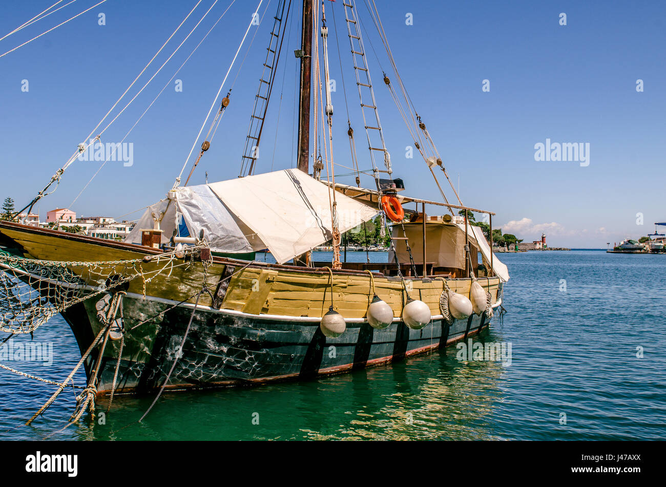 Old sailboat still in the port of Ischia, Italy Stock Photo - Alamy