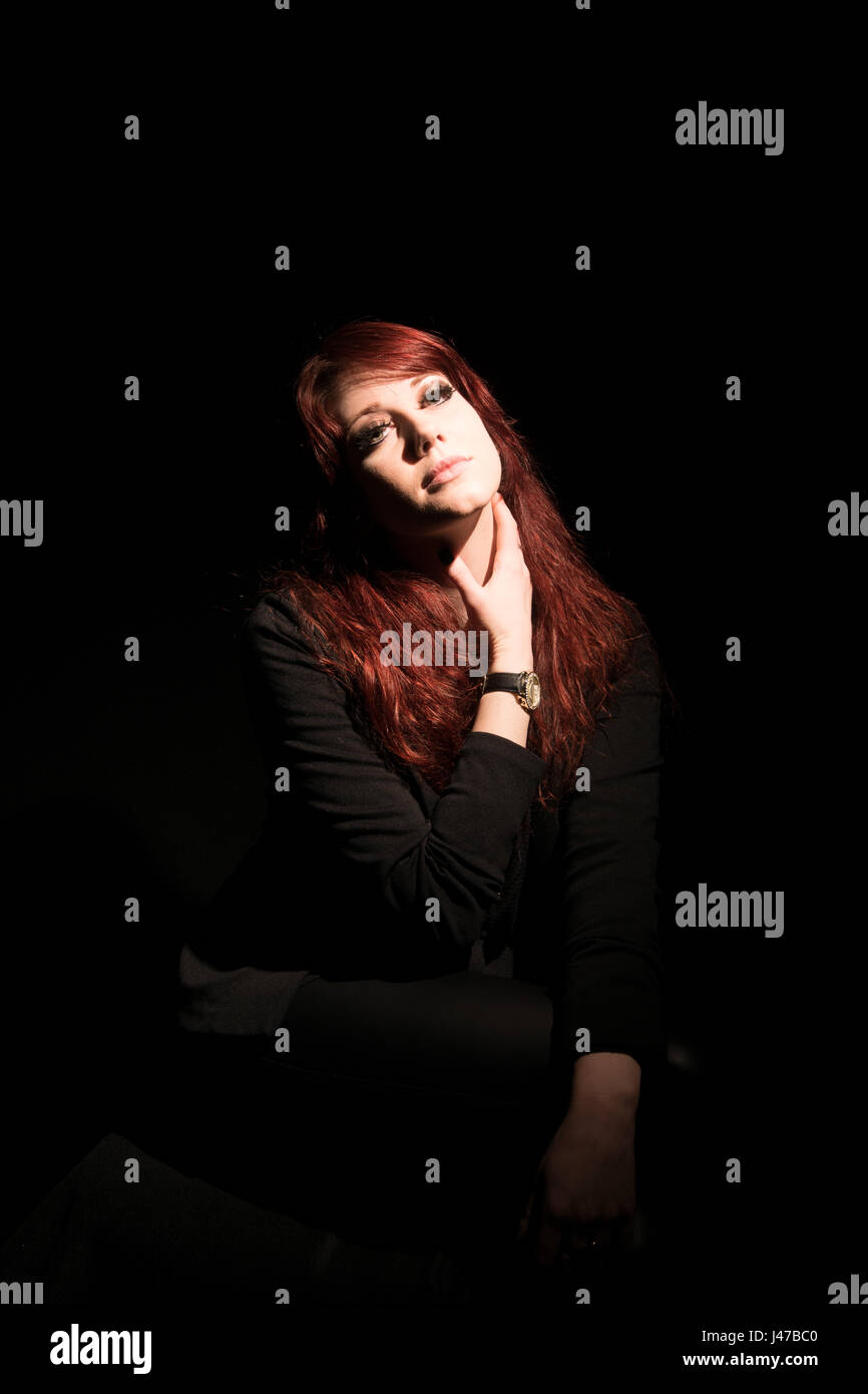 Low key portraits, female Stock Photo - Alamy