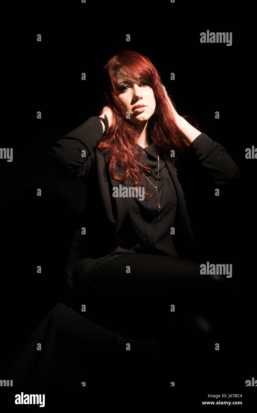 Low key portraits, female Stock Photo - Alamy