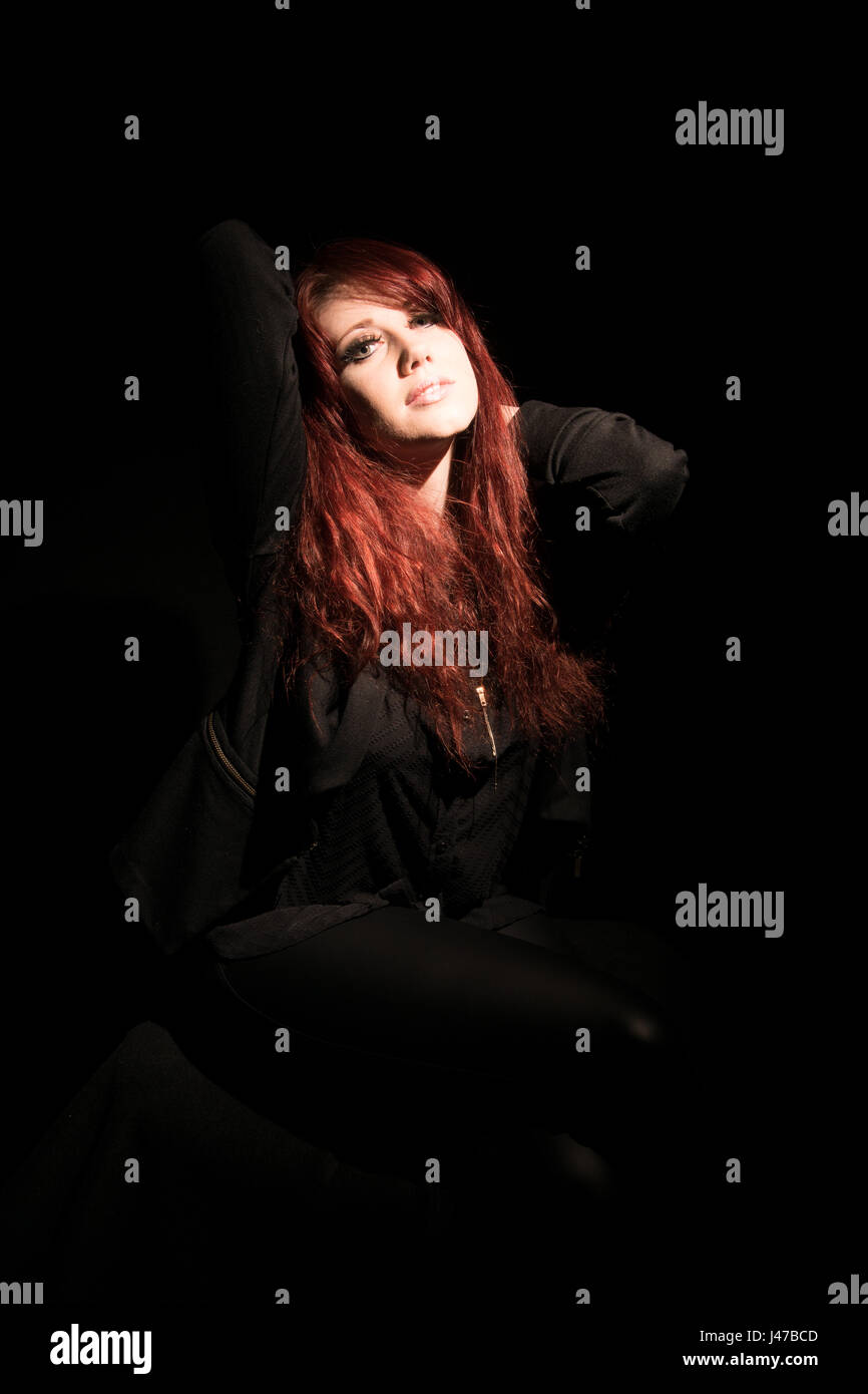 Low key portraits, female Stock Photo - Alamy