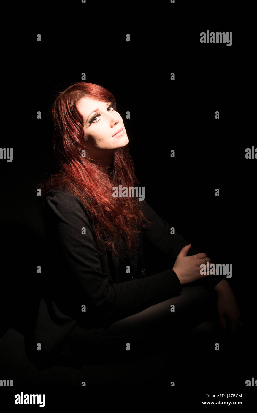 Low key portraits, female Stock Photo - Alamy