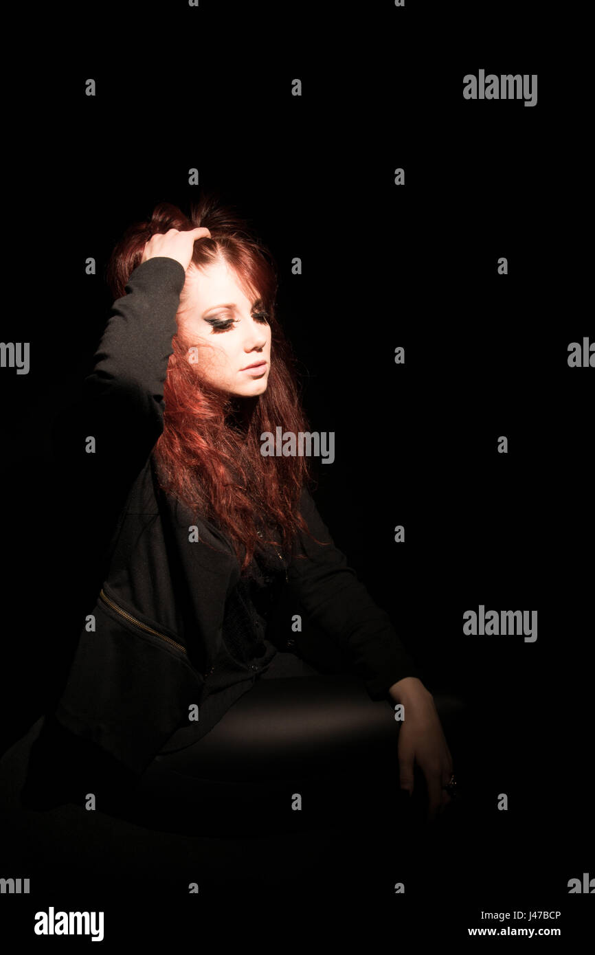Low key portraits, female Stock Photo - Alamy