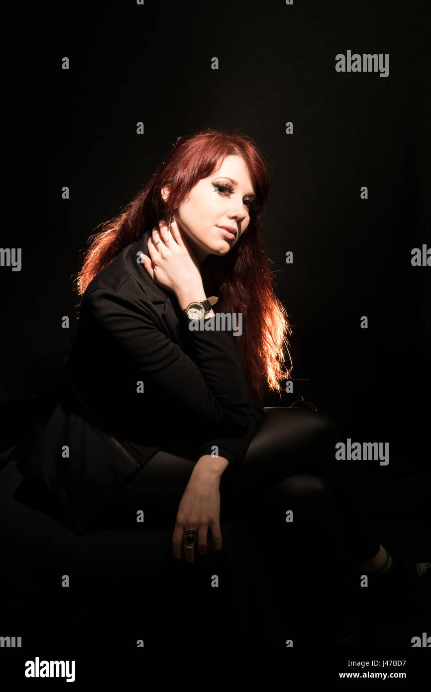 Low key portraits, female Stock Photo - Alamy