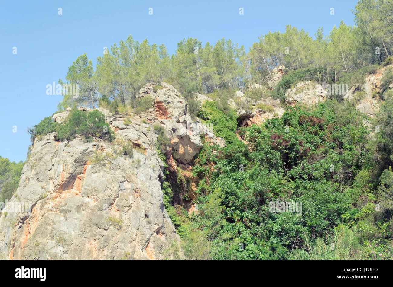 Rocky cliff near to the swimming area called The Spring of Bathes ...