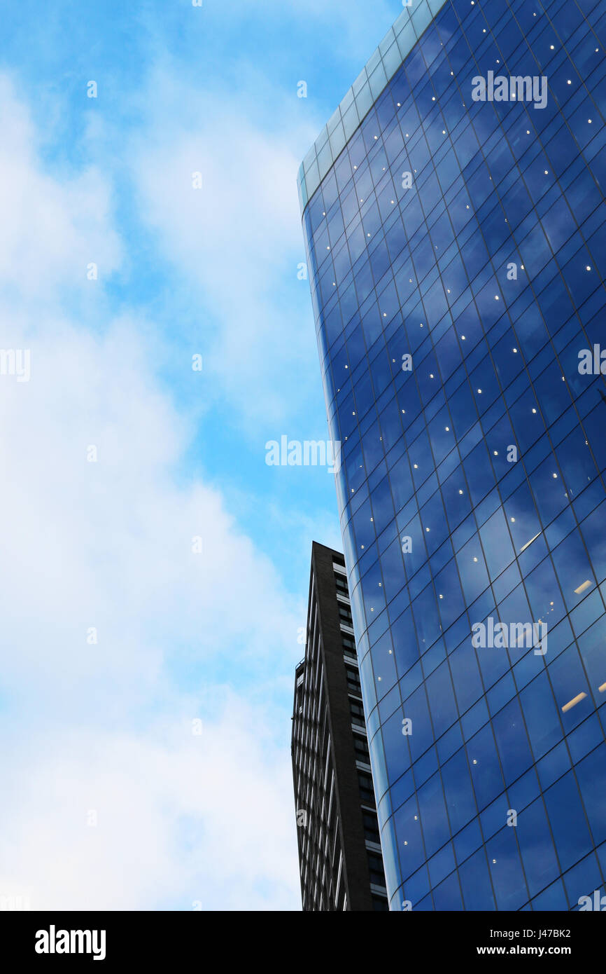City building with sky reflected Stock Photo - Alamy