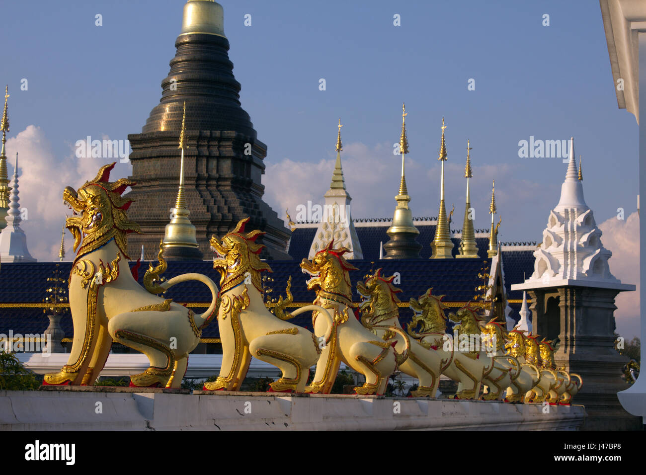 Singha mythical lion figures at the Buddhist temple complex of Wat Ban ...