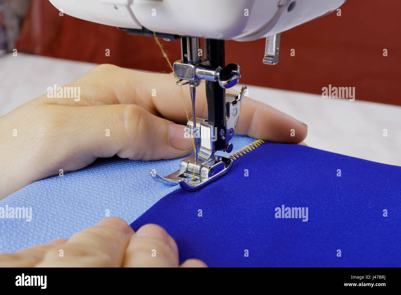 The sewing process on a modern sewing machine Stock Photo - Alamy