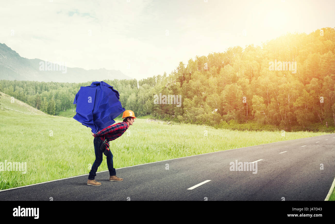 Engineer man carry load Stock Photo - Alamy