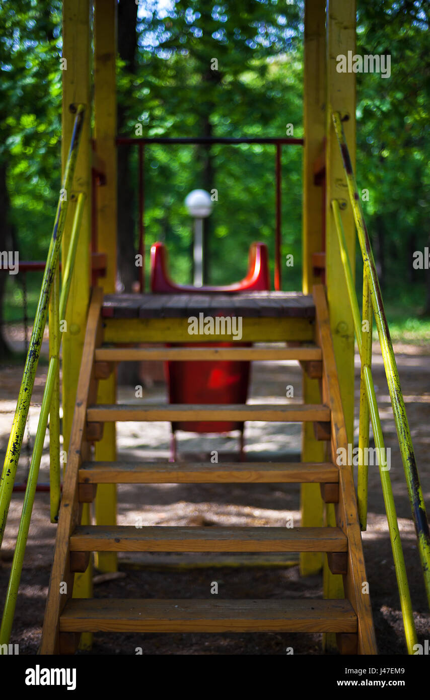 Details of playground in city park, view on wooden staircases as part ...