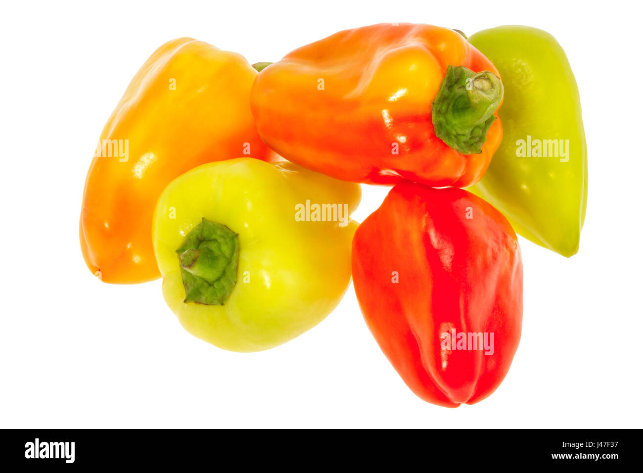Image of ripe bell peppers on a white background Stock Photo - Alamy