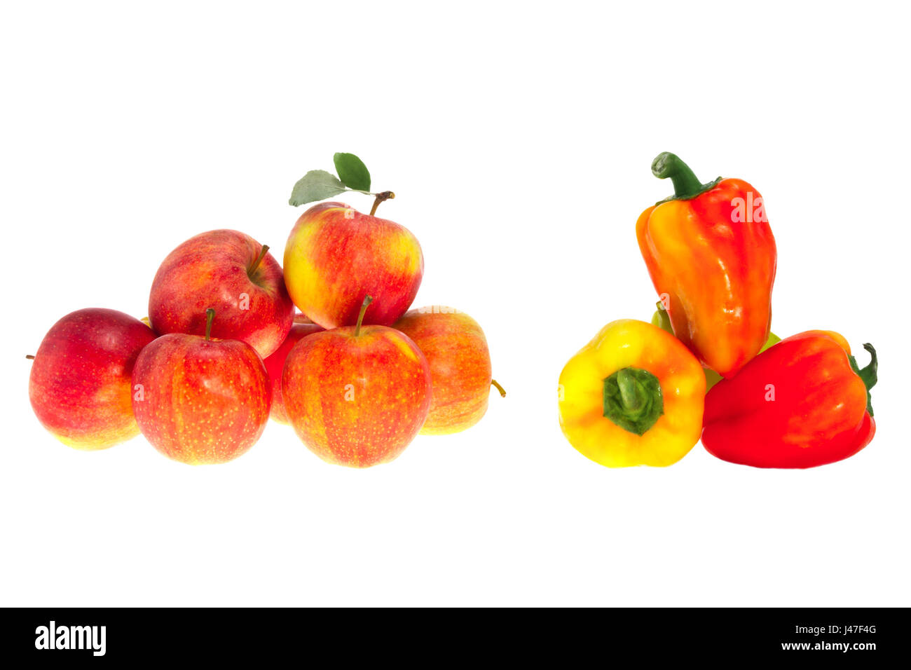 a Red ripe apples and sweet pepper on a white background Stock Photo ...