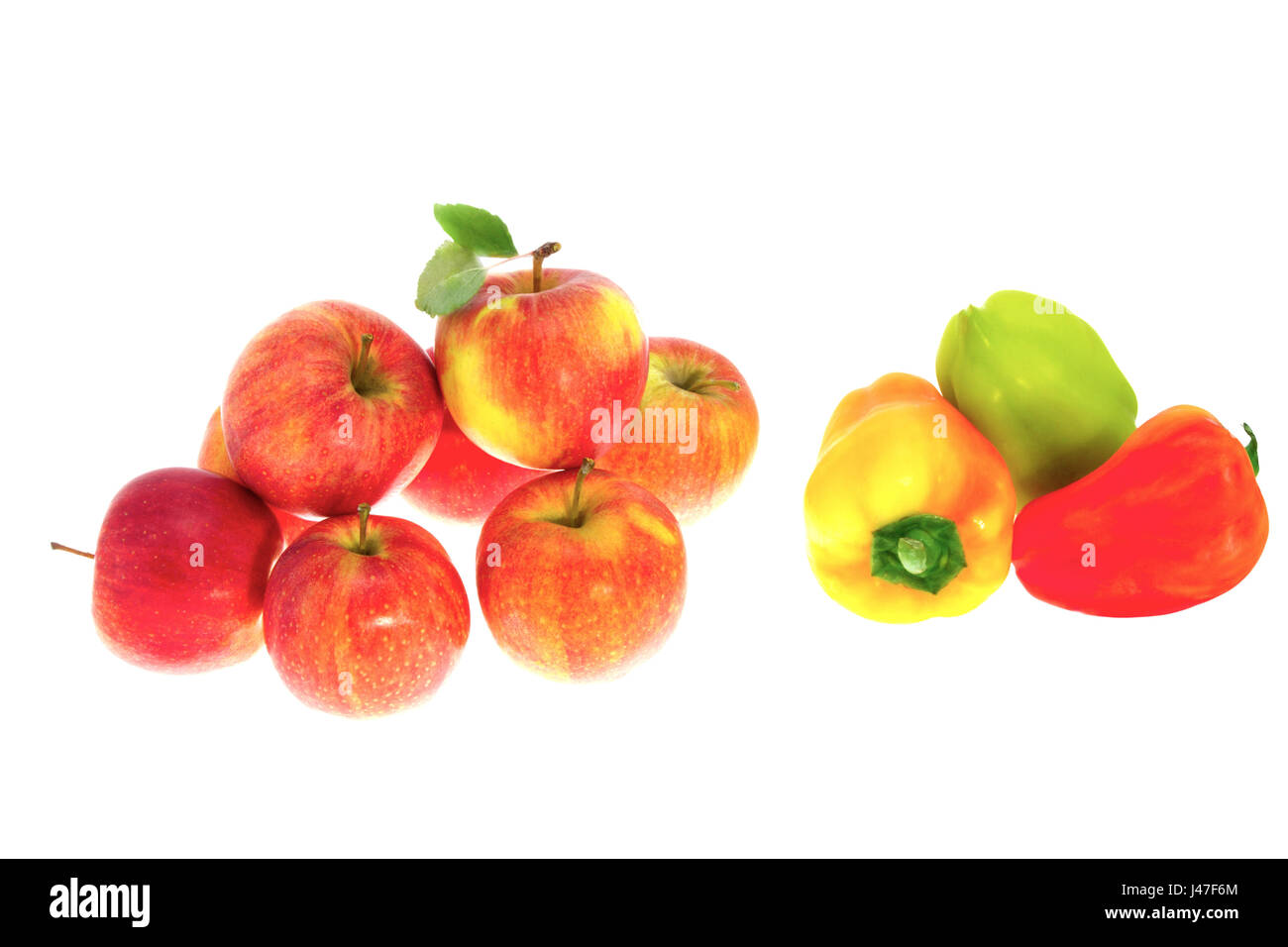 a Red ripe apples and sweet pepper on a white background Stock Photo ...