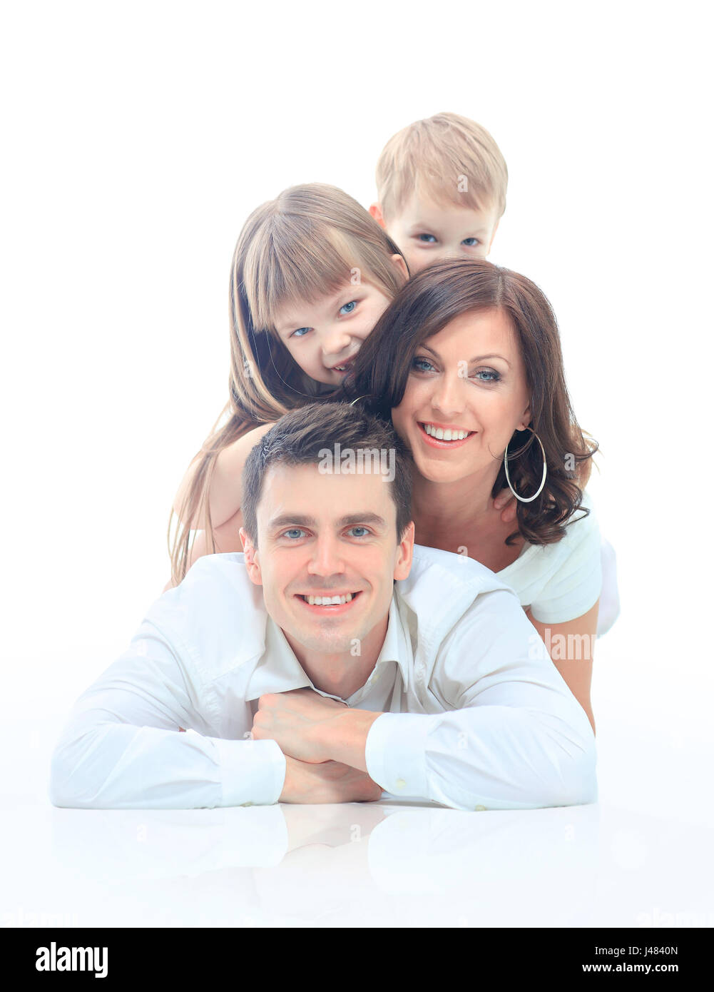 Happy family smiling. Isolated over a white background Stock Photo - Alamy