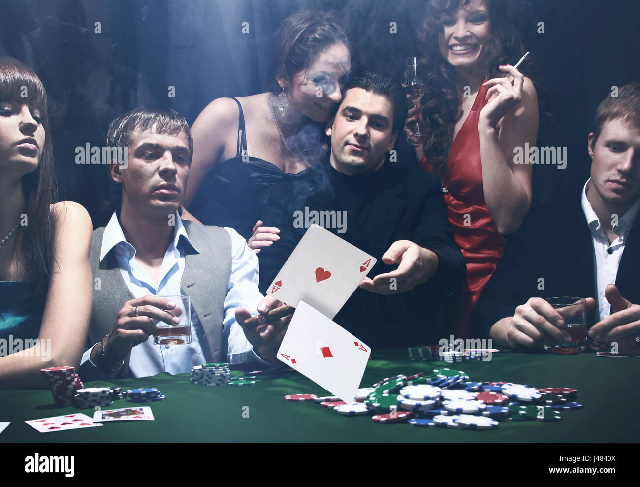 People around poker table hi-res stock photography and images - Alamy