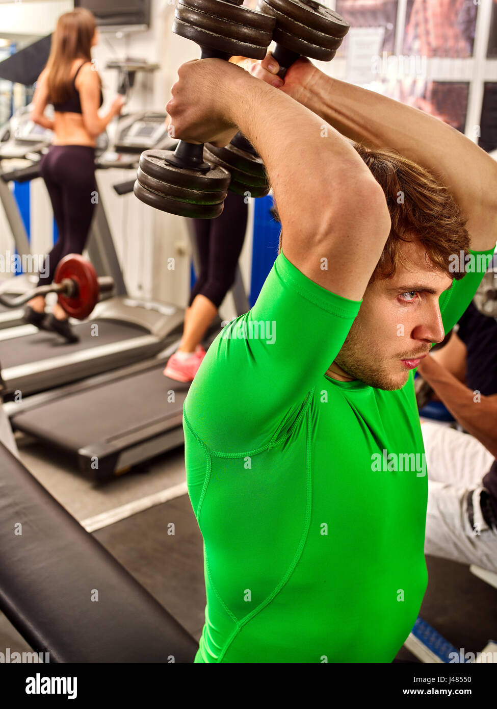 Fitness men friends in gym workout weights with equipment Stock Photo ...