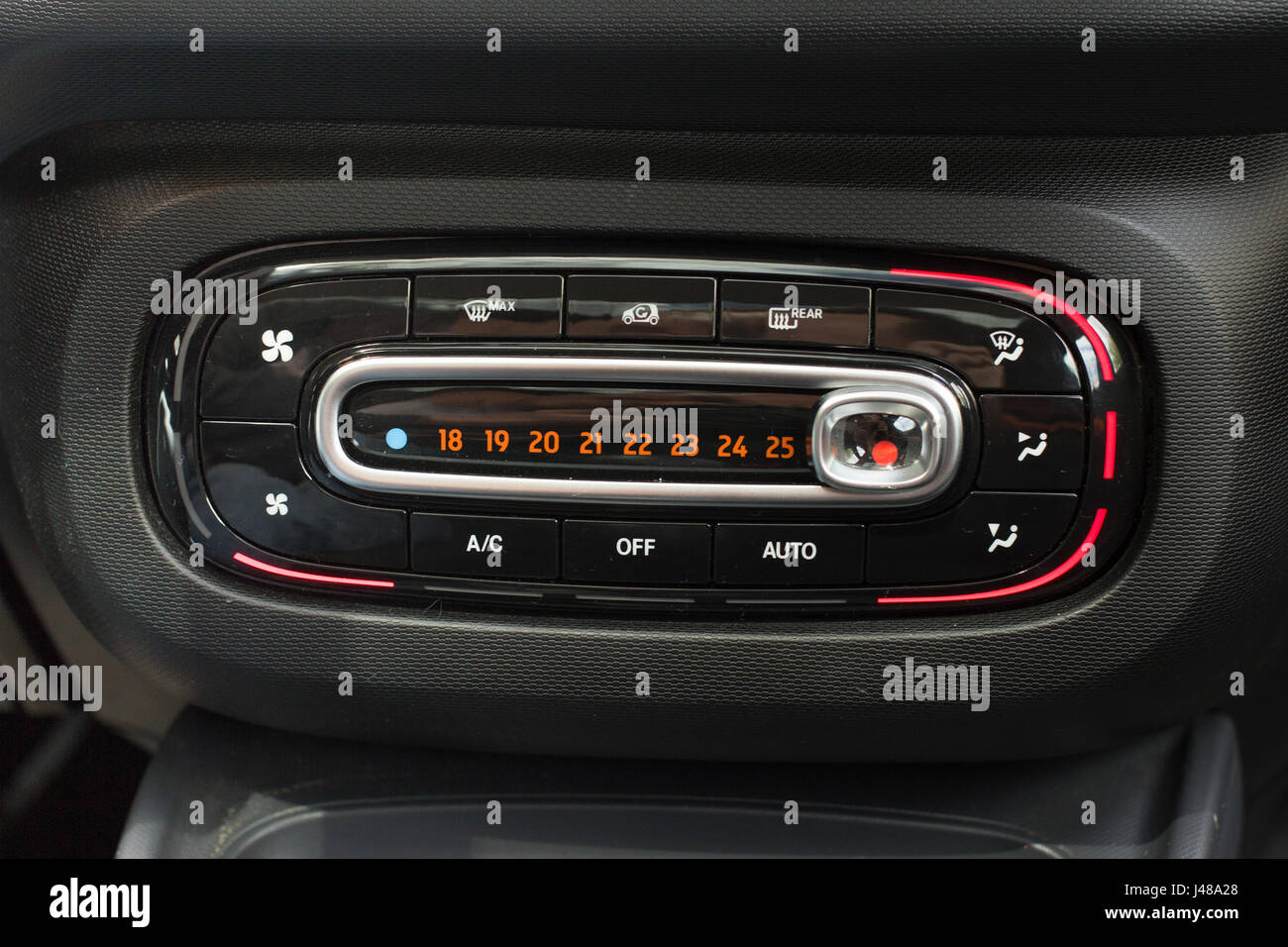 Smart Temperature control device on car center console Stock Photo - Alamy
