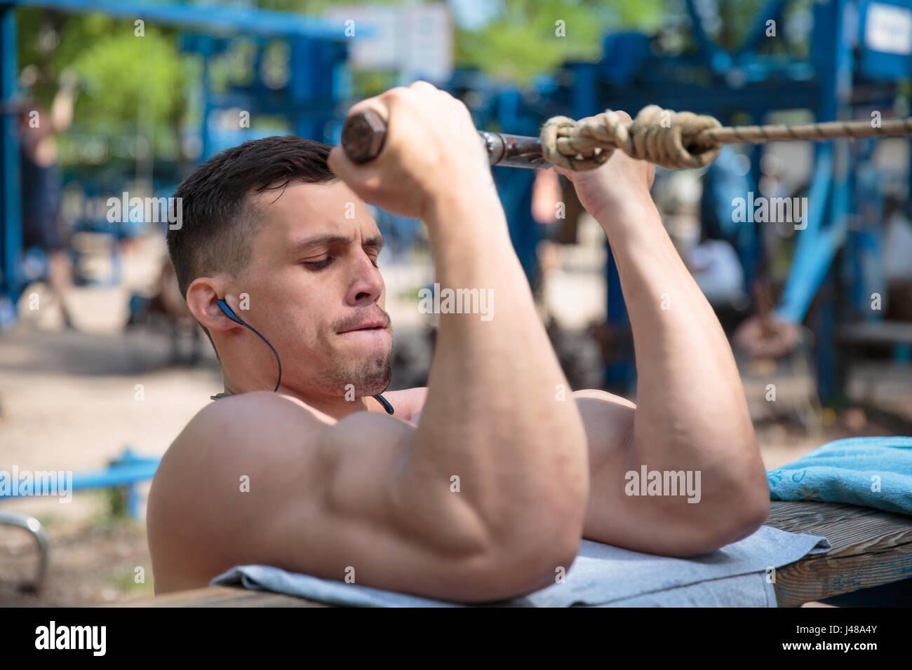 Strong Guy Doing Hard Exercises High Resolution Stock Photography and ...