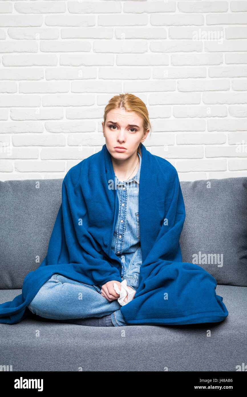 Young Woman Feeling Sick or Sad Wrapped in Cozy Blue Blanket and ...