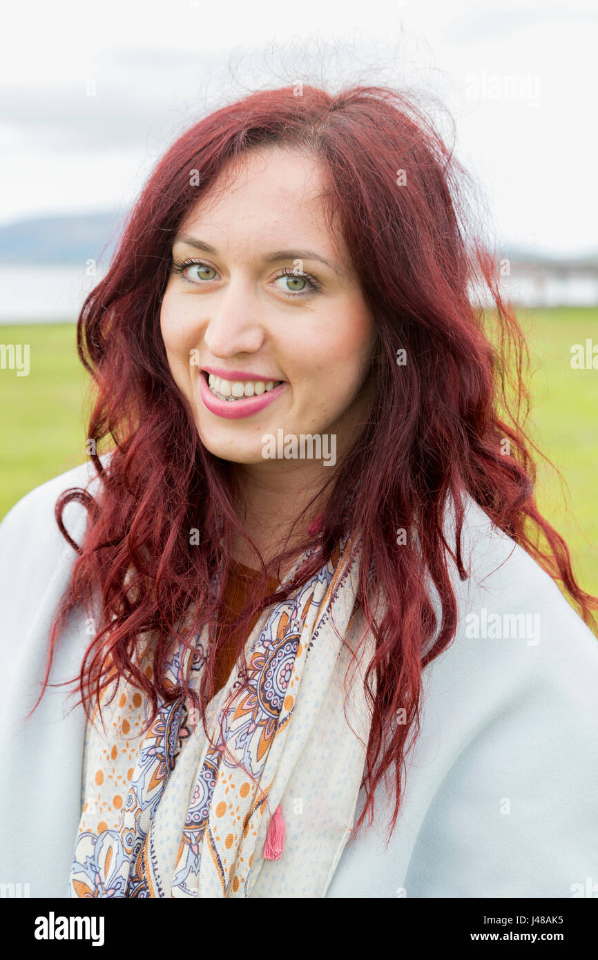 Beautiful Eastern European Woman with long dyed red hair Stock Photo ...