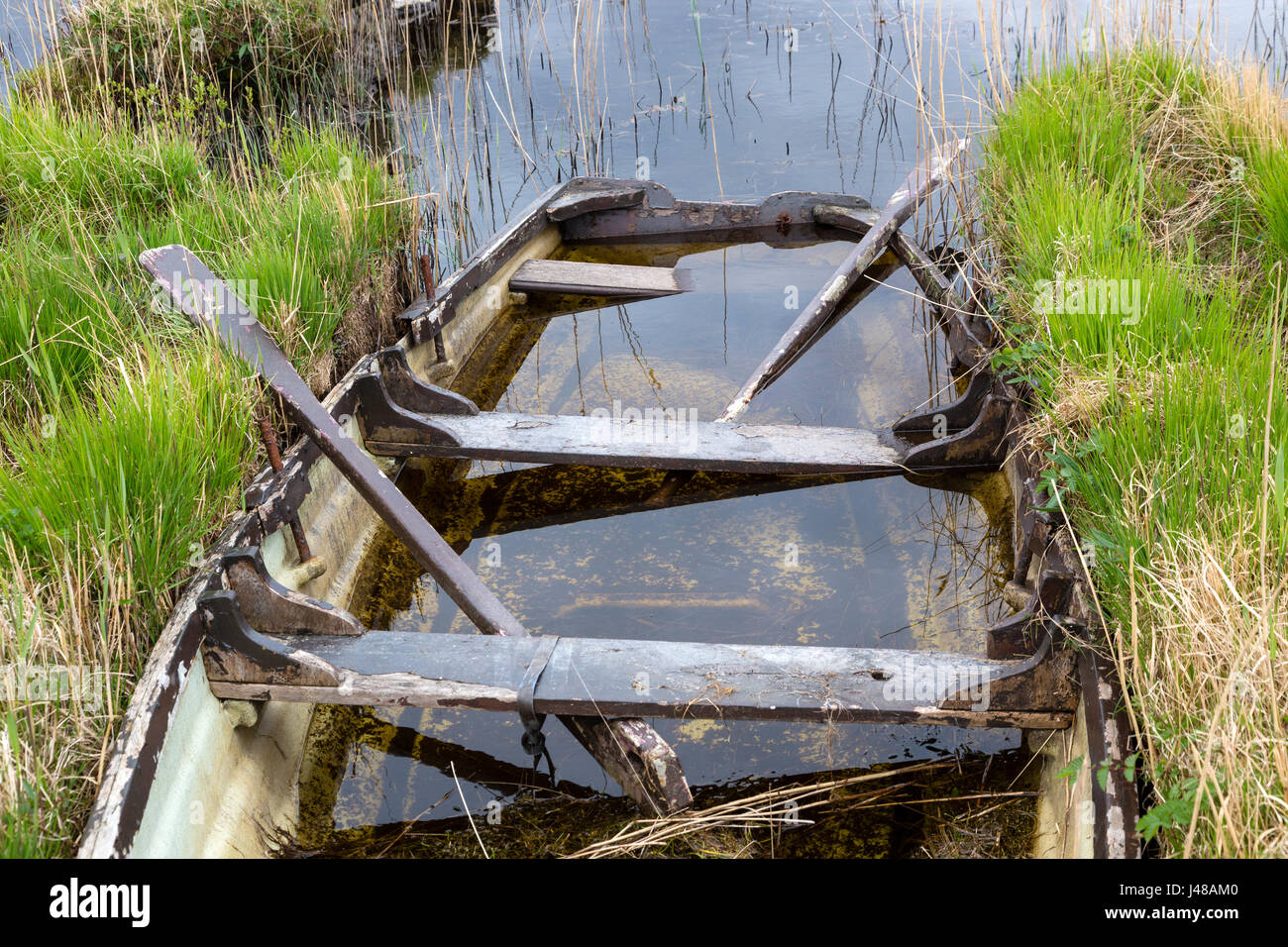 Sunken rowing boat hi-res stock photography and images - Alamy