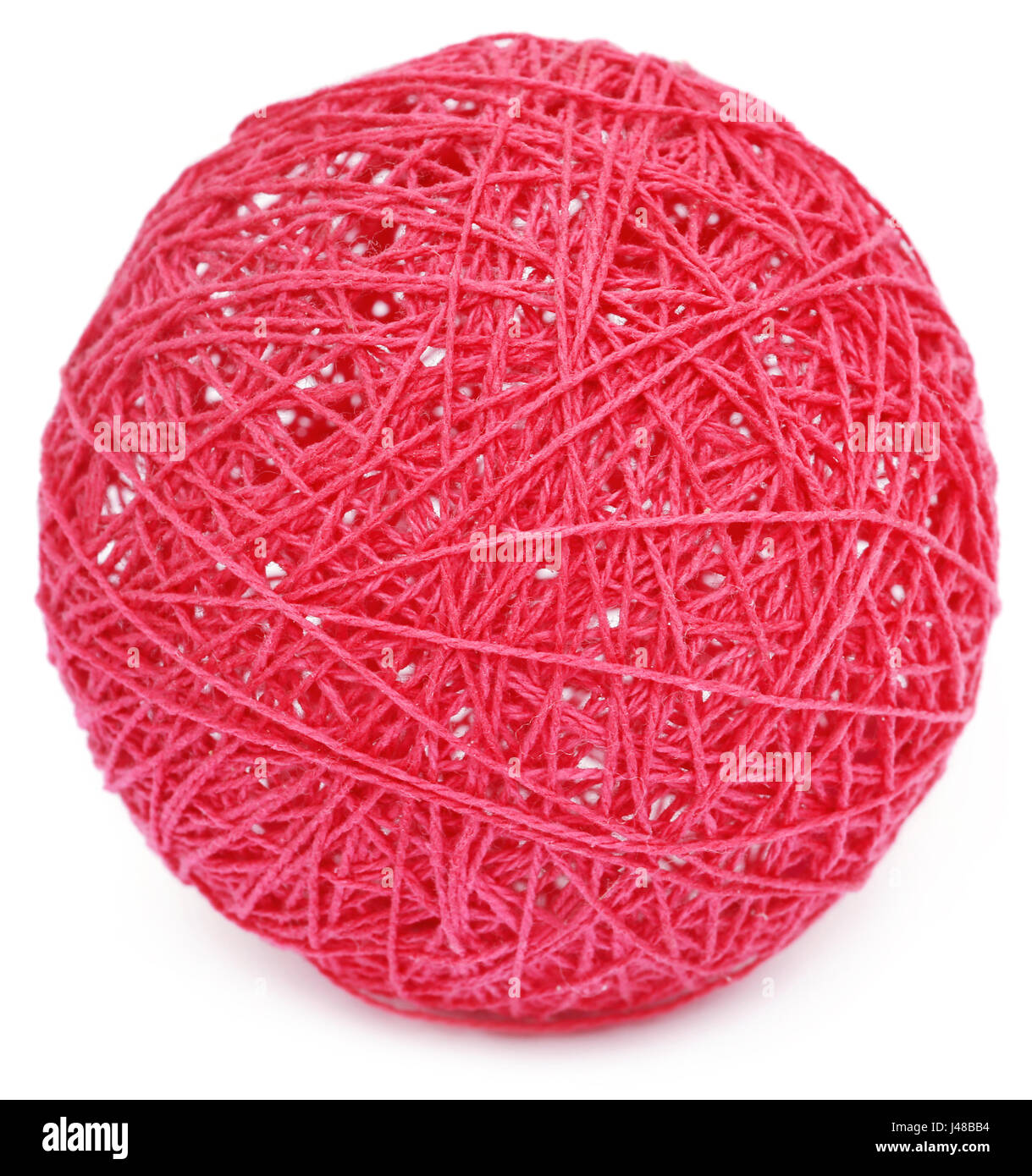 Decorative hollow thread roll over white background Stock Photo - Alamy