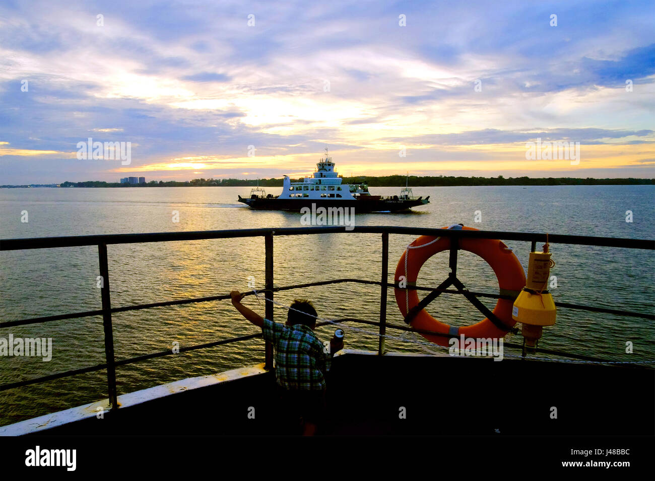 sunset view from the ferry Stock Photo - Alamy