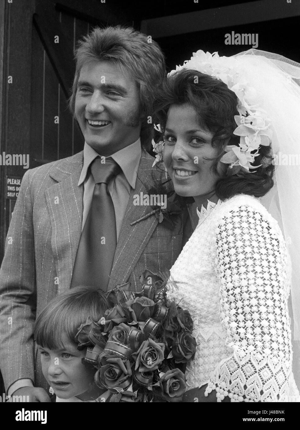 Alan Hudson, Chelsea's 19-year-old forward, smiles next to his bride ...