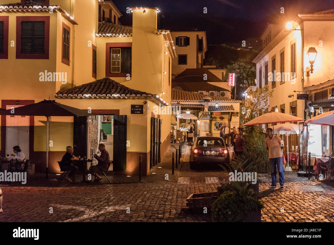 Open air restaurants at night in the Old Town of Funchal, Madeira Stock ...
