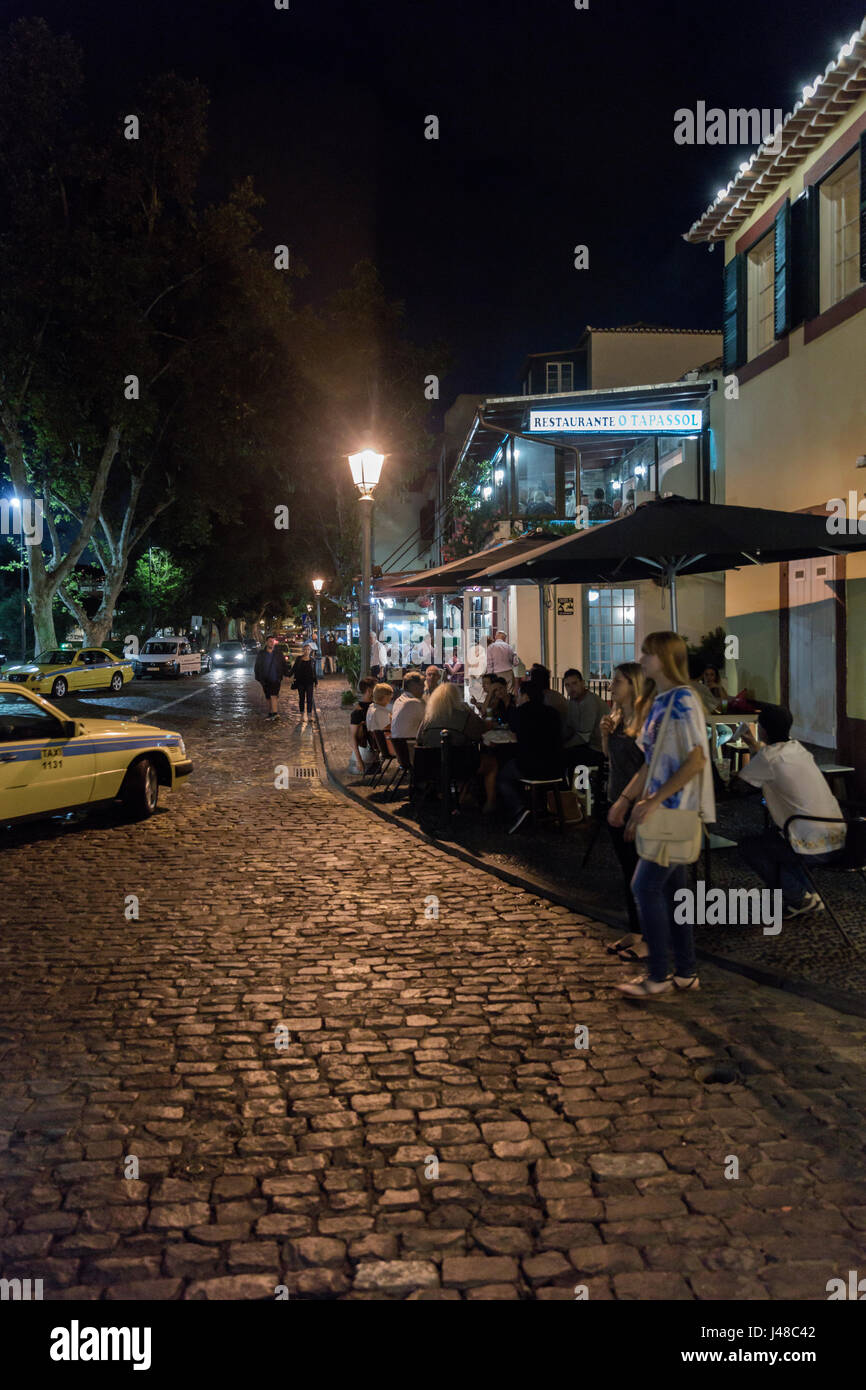 Open air restaurants at night in the Old Town of Funchal, Madeira Stock ...