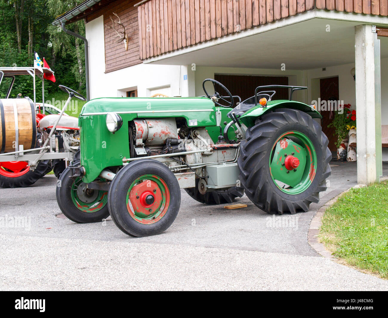 Obersaxen, Switzerland - August 1, 2016: huerlimann old tractor parked ...