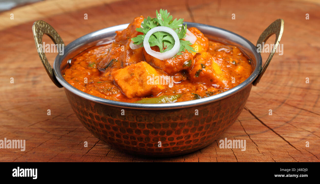 Indian Food or Indian Curry in a copper brass serving bowl Stock Photo ...