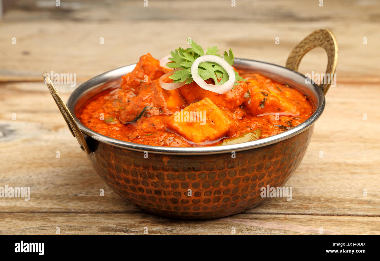 Indian Food or Indian Curry in a copper brass serving bowl Stock Photo ...
